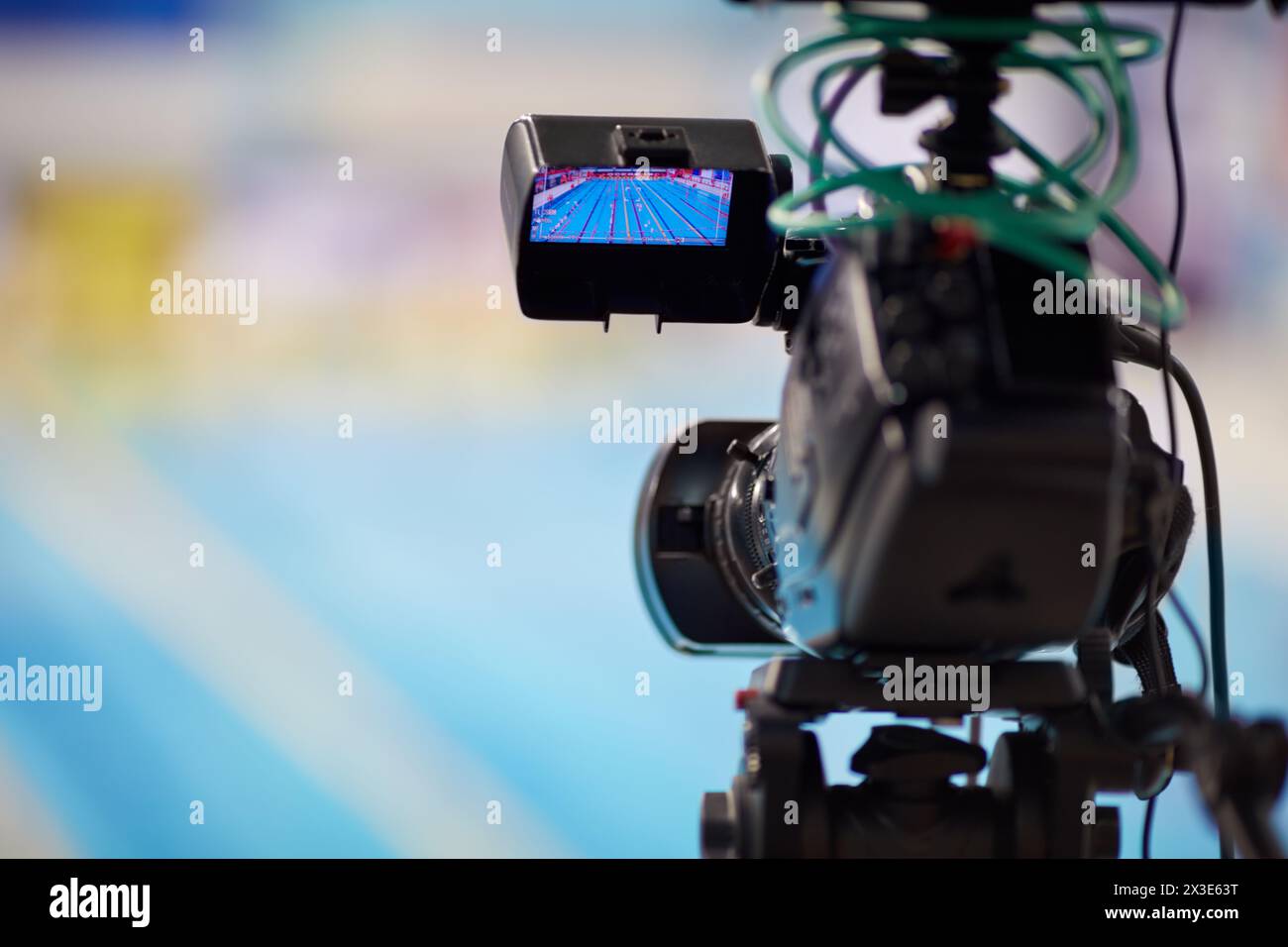 Modern camera during reporting from swimming basin, shallow dof Stock ...
