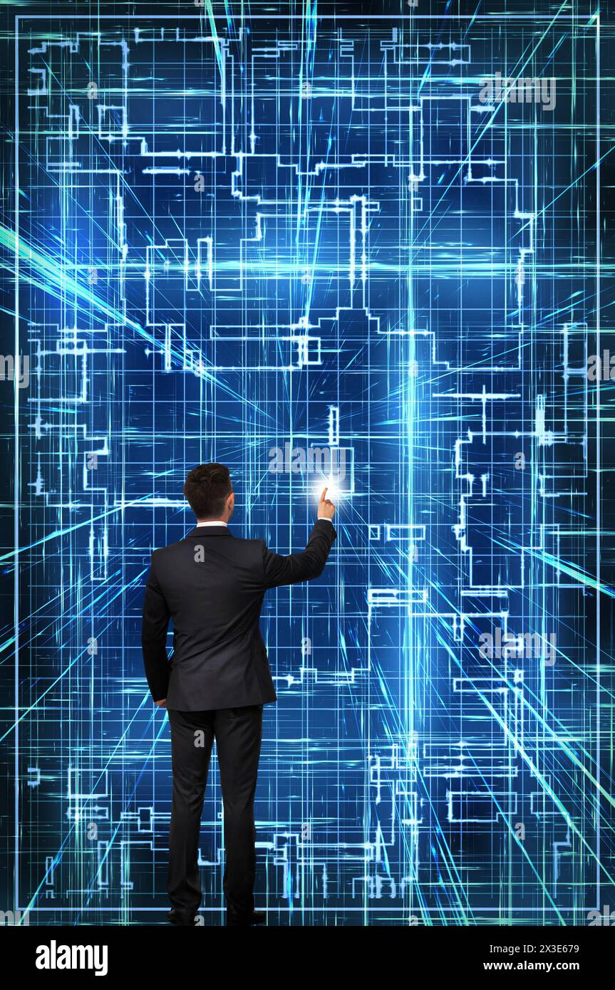 businessman touching a screen with a glowing tech schematic Stock Photo ...