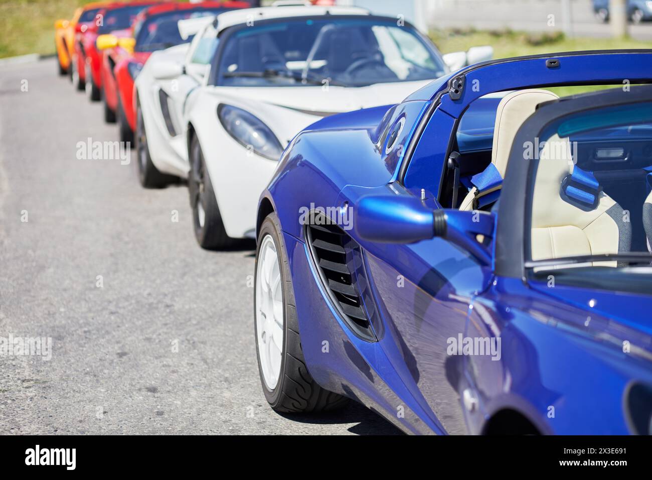 MOSCOW, RUSSIA - MAY 27, 2018: Column of several Lotus cars stand in ...
