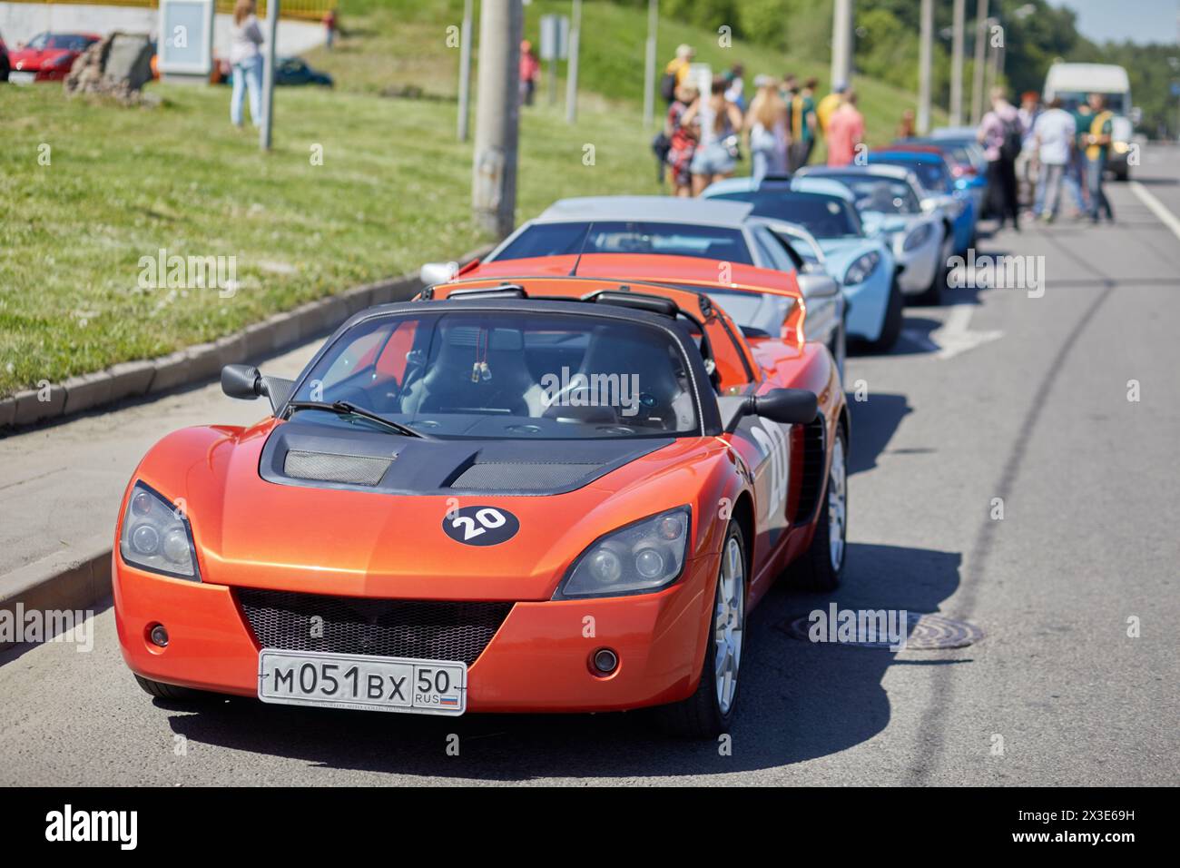 MOSCOW, RUSSIA - MAY 27, 2018: Сolumn of Lotus sports cars stands at ...