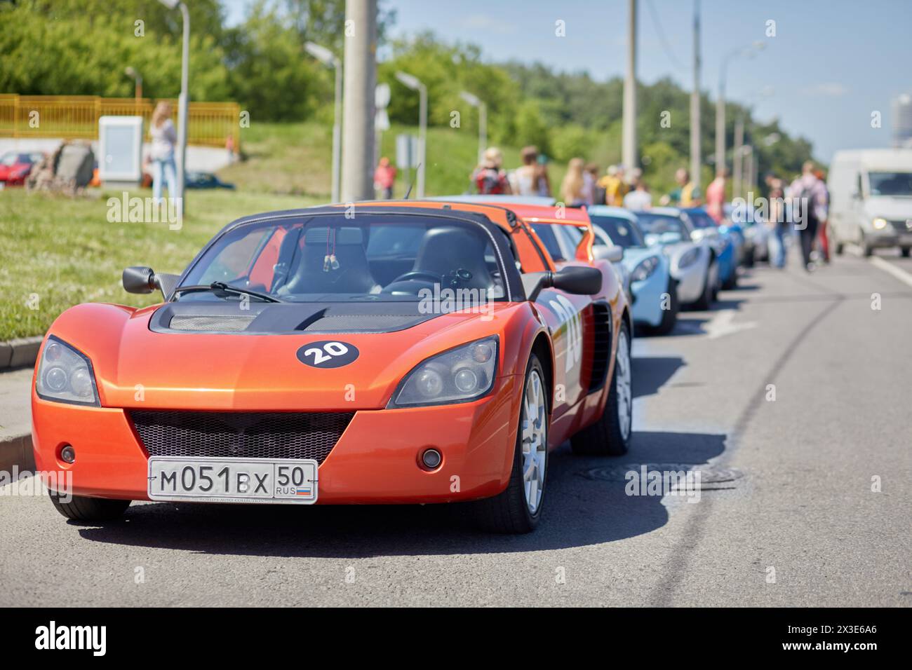 MOSCOW, RUSSIA - MAY 27, 2018: Сolumn of Lotus sports cars stands at ...