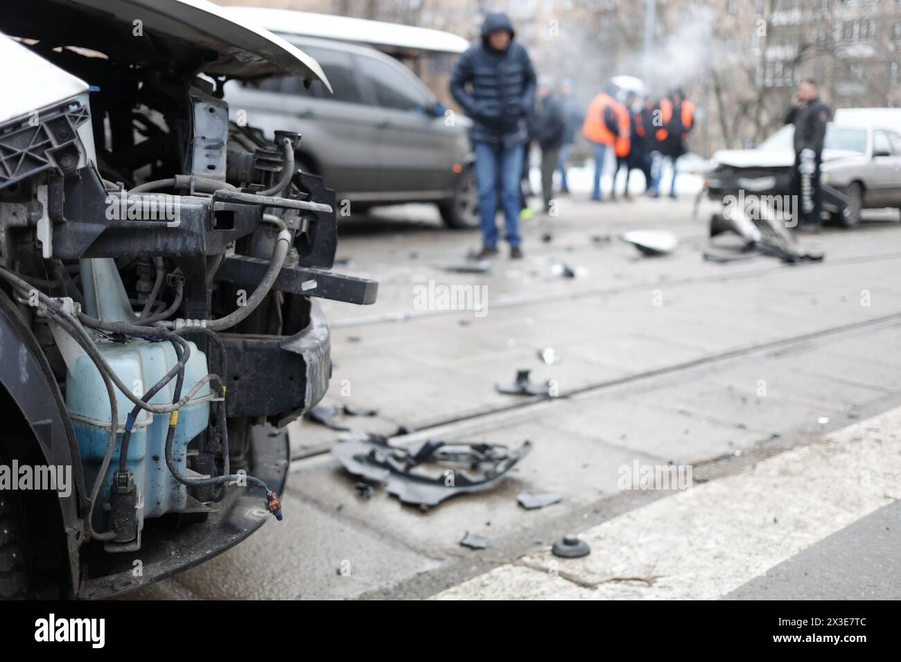 Group car accident with many damages in city, people out of focus at ...