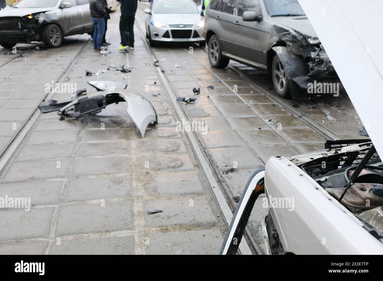 Group car accident with many damages on street, people and police car ...