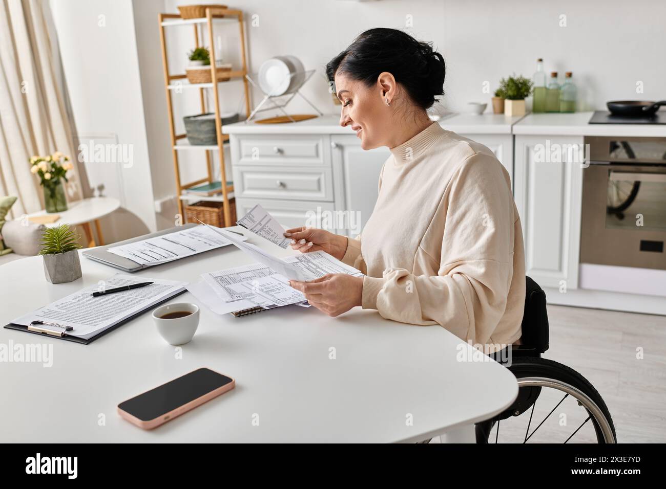 A disabled woman in a wheelchair, engrossed in reading a paper while ...