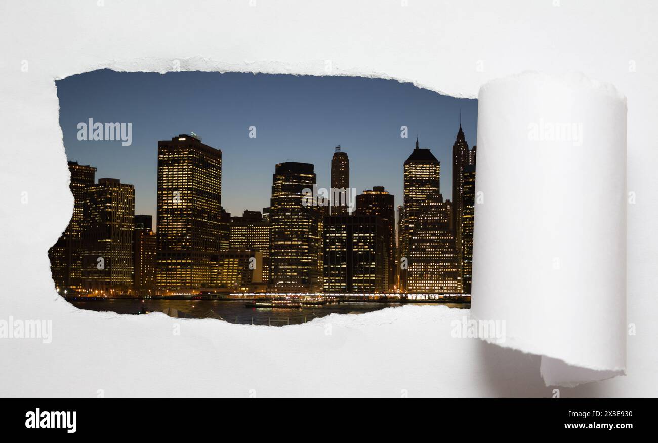 Night New York view behind sheet of torn paper against, collage Stock ...