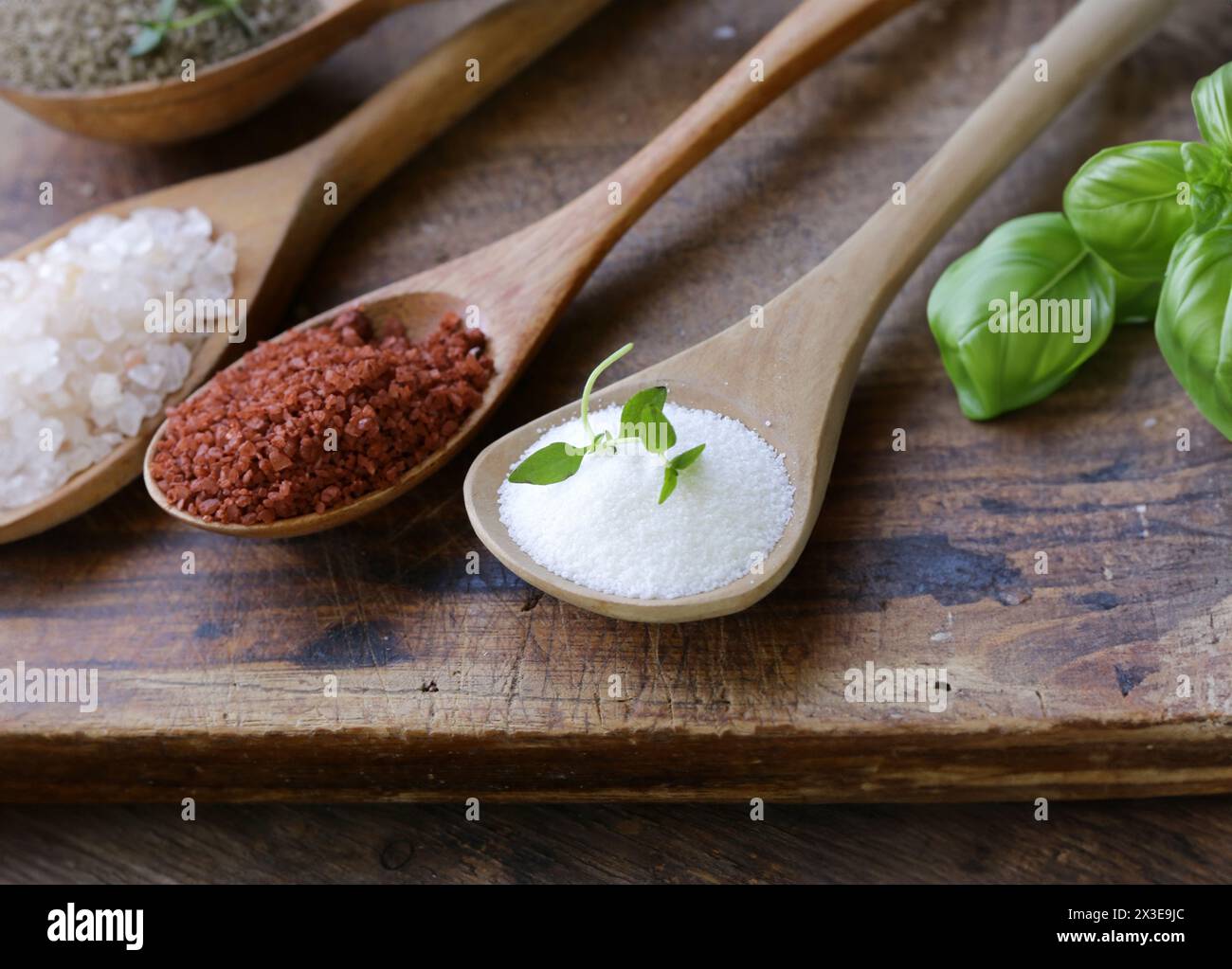 different varieties of salt in wooden spoons Stock Photo - Alamy