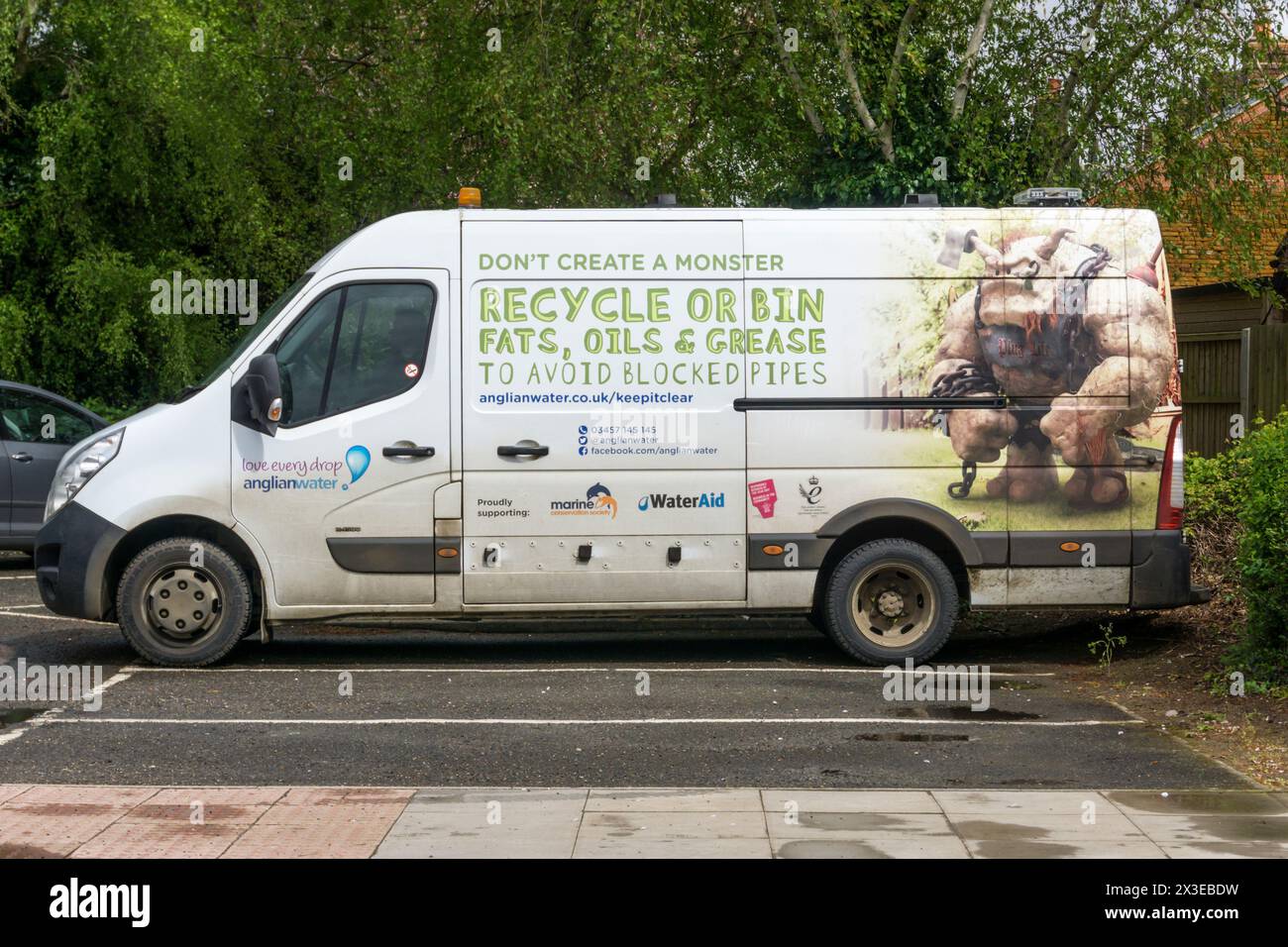 An Anglian Water van with an illustration encouraging people to recycle ...