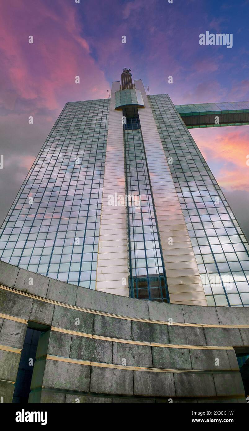 The grandeur of an Art Deco skyscraper is magnified against the canvas ...