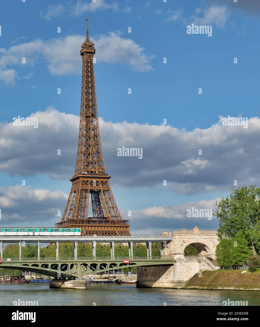 Paris Metro Crossing Iconic Steel Bridge with Eiffel Tower Background ...
