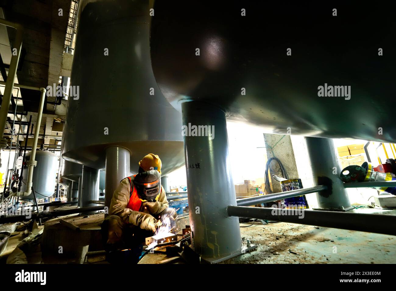ZHANGYE, CHINA - APRIL 24, 2024 - Construction workers weld a pipeline ...