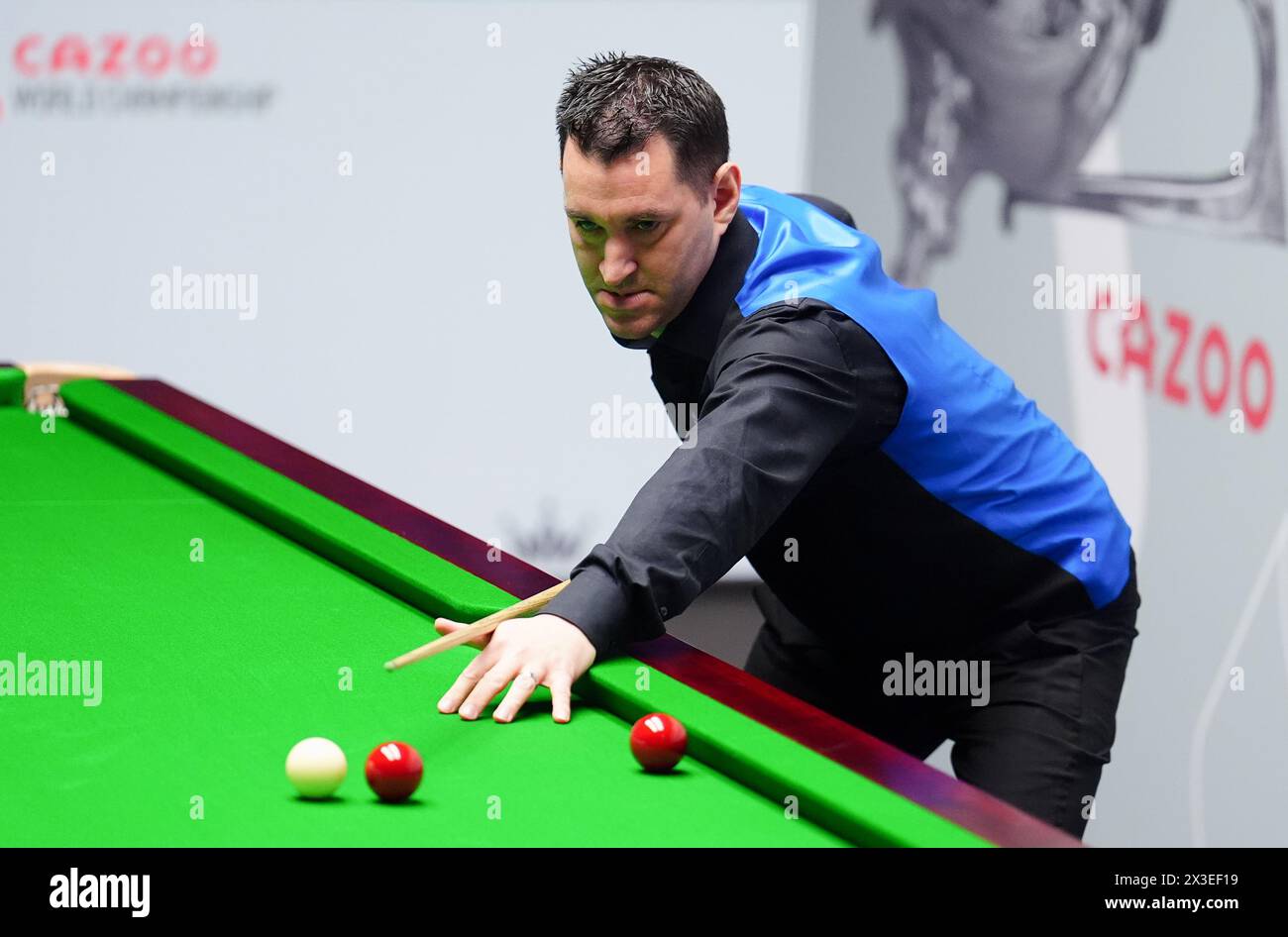 Tom Ford in action against Judd Trump (not pictured) on day seven of ...