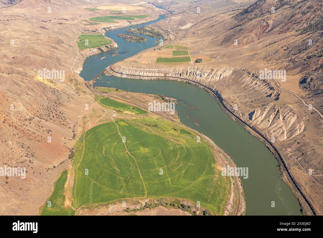 Vertical view surface of river among the mountains. Aerial photo from ...