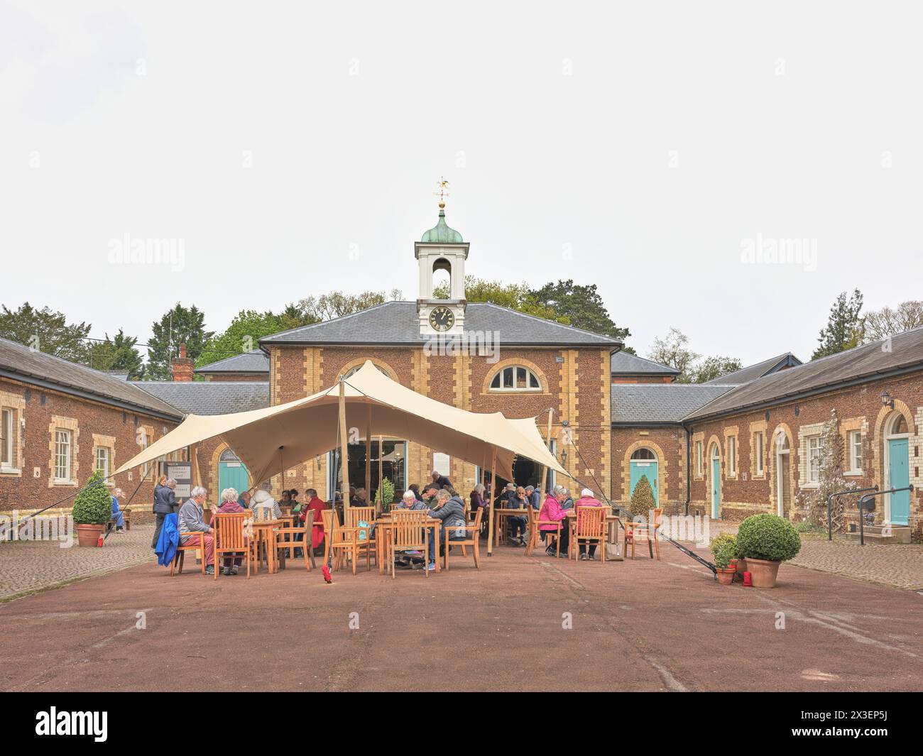 Visitors in the stable courtyard at the country residence of the ...
