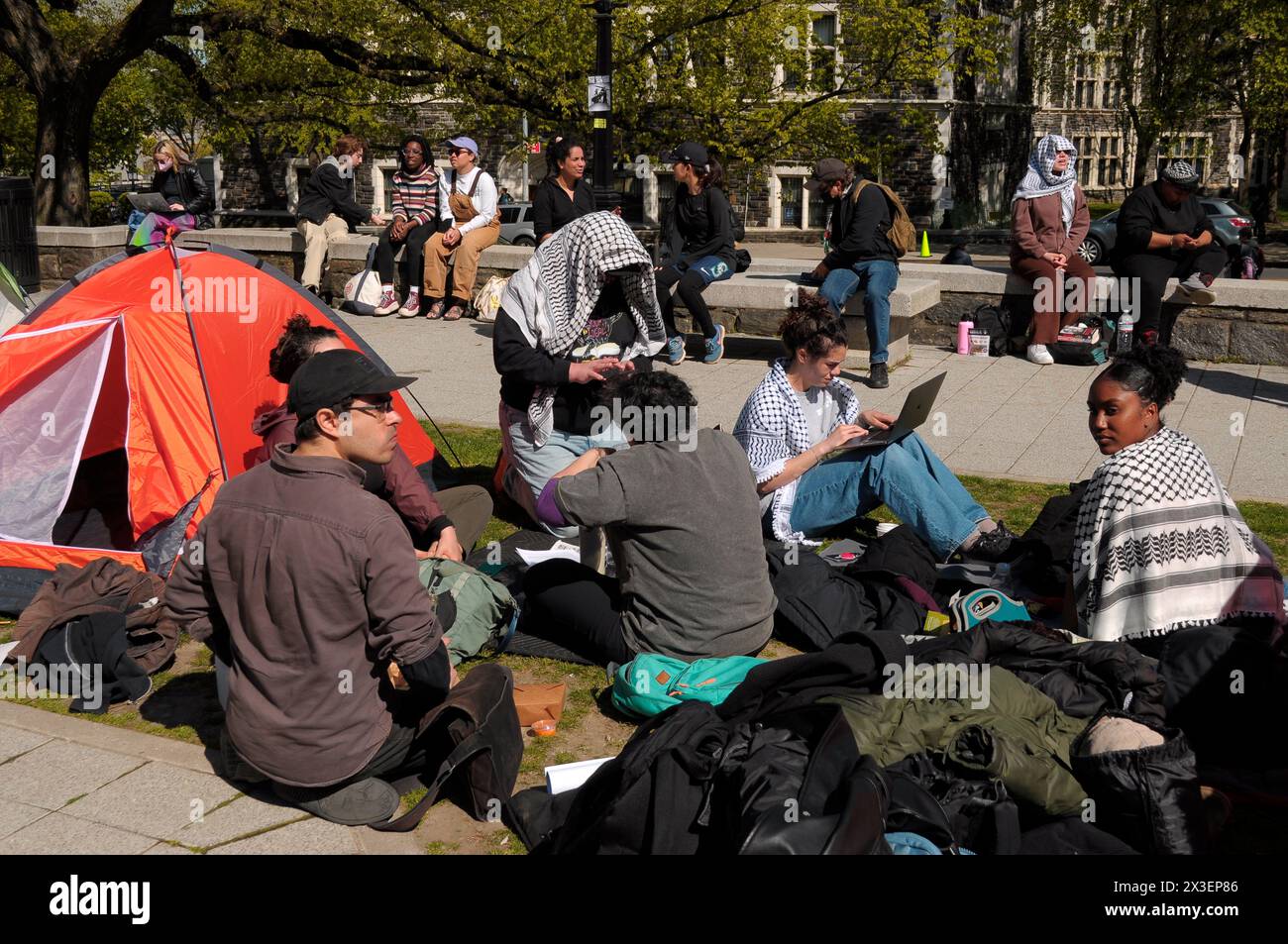 Protesters sit at a pro-Palestine encampment at the City College of New ...