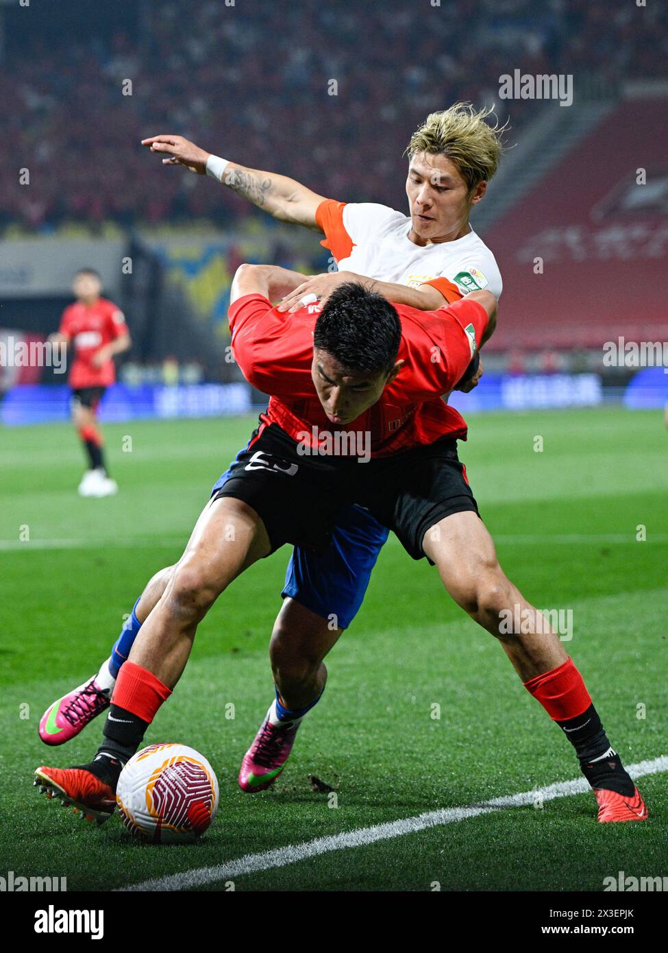 Chengdu, China's Sichuan Province. 26th Apr, 2024. Yang Yiming (front ...
