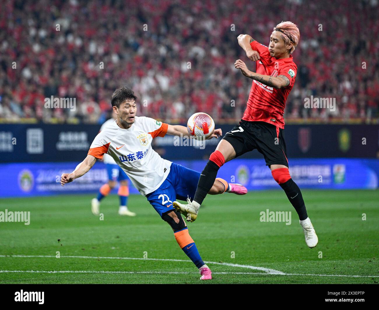 Chengdu, China's Sichuan Province. 26th Apr, 2024. Wei Shihao (R) of ...