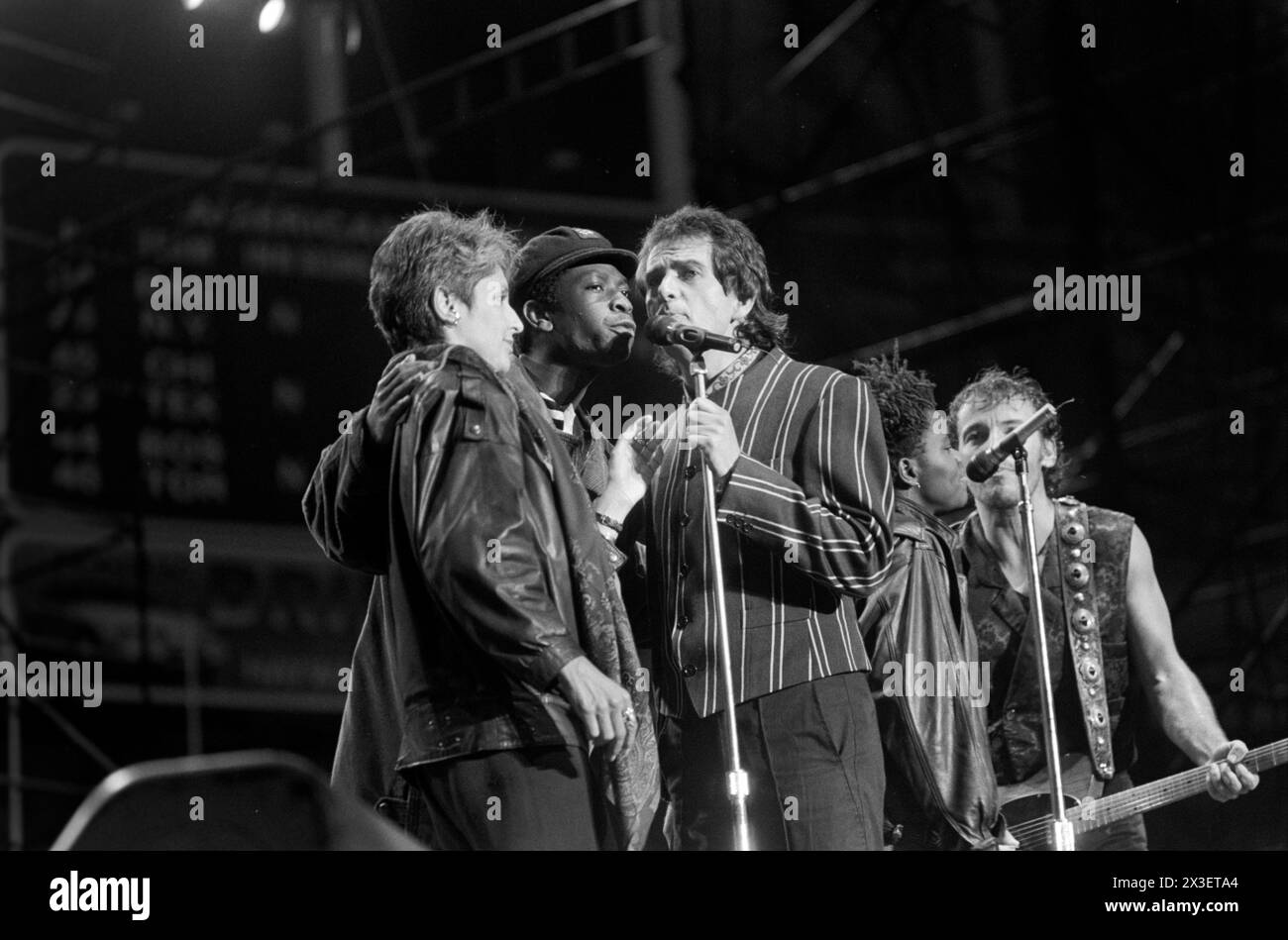 Joan Baez, Youssou N'Dour ,Peter Gabriel Tracy Chapman and Bruce Springsteen performs during ...
