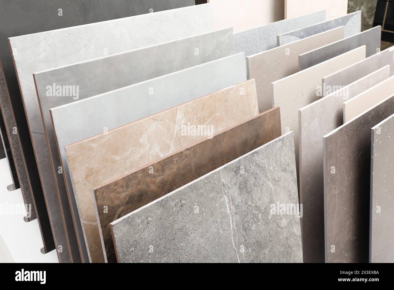 Many different samples of tiles on display in store Stock Photo - Alamy