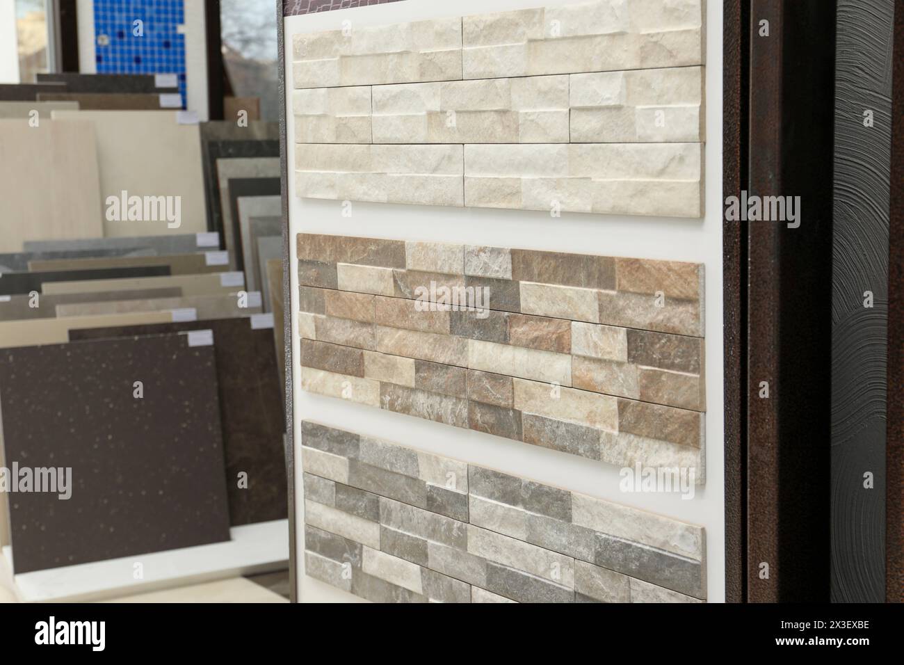 Many different samples of tiles on display in store Stock Photo - Alamy
