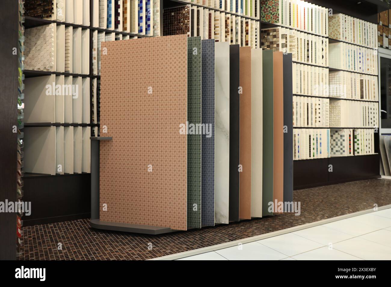 Many different samples of tiles on display in store Stock Photo - Alamy