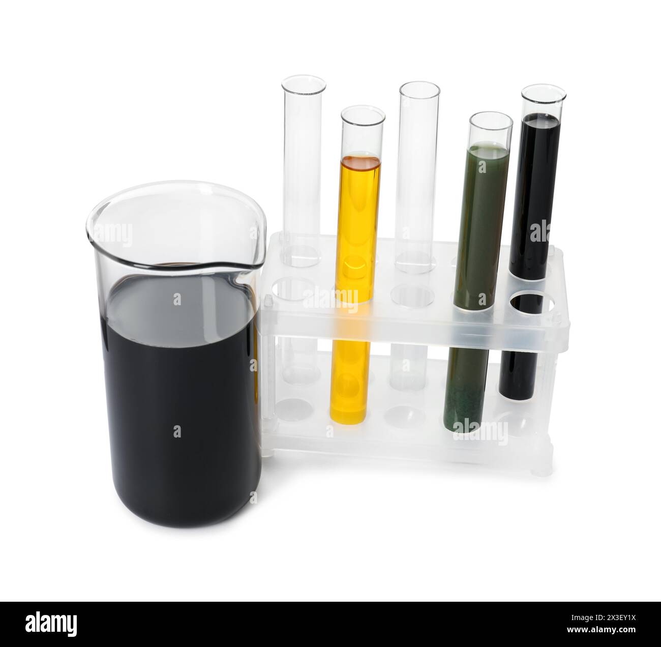 Beaker and test tubes with different types of oil isolated on white ...