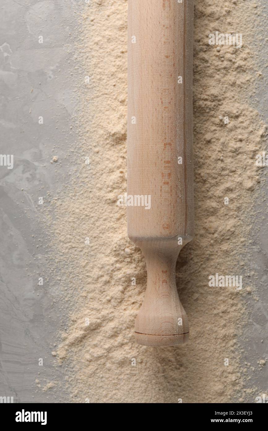 Flour and rolling pin on grey marble table, top view Stock Photo - Alamy