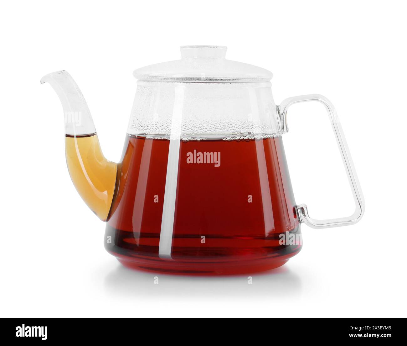 Tasty tea in teapot isolated on white Stock Photo - Alamy