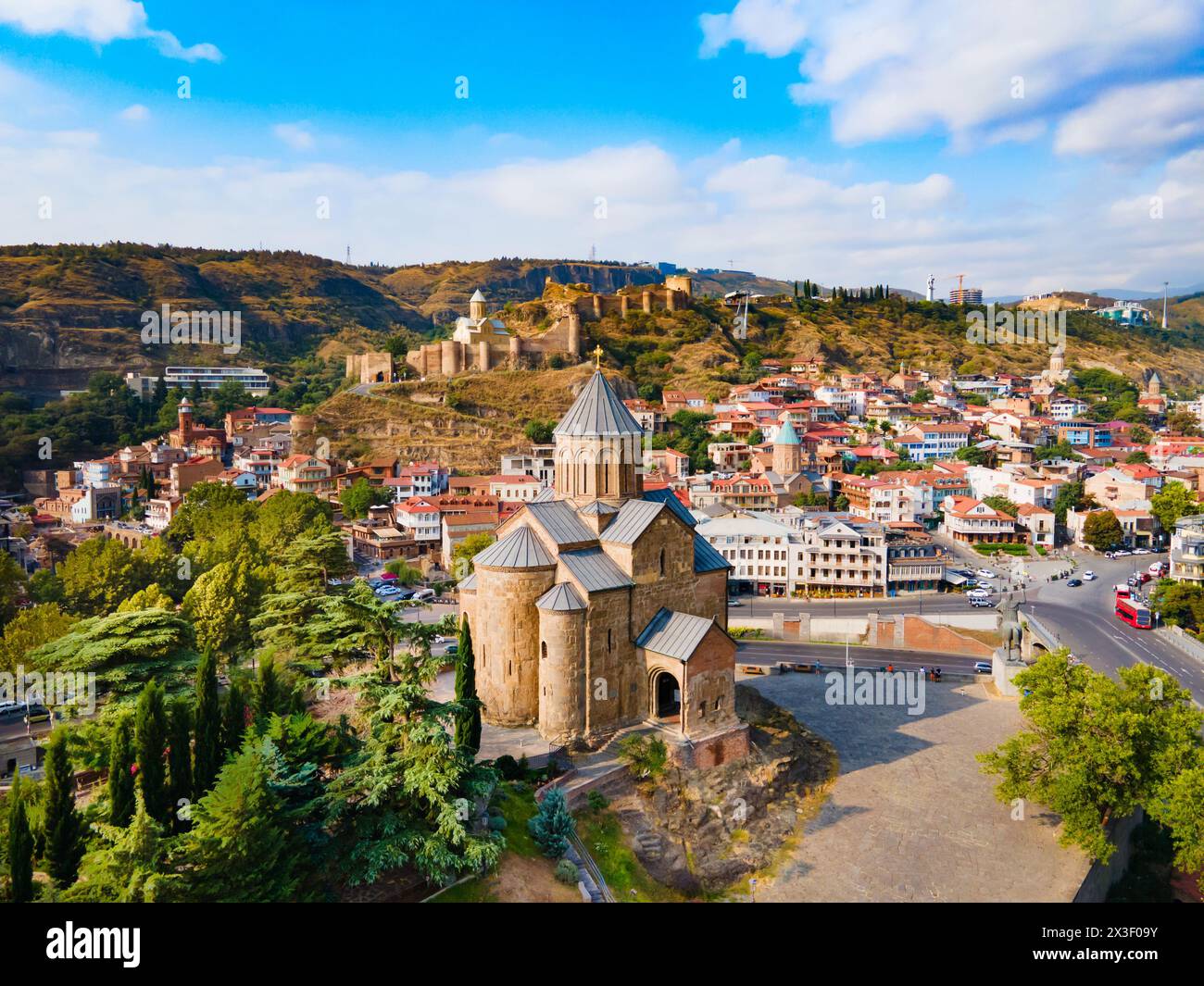 Metekhi Church aerial panoramic view in Tbilisi old town. Tbilisi is ...