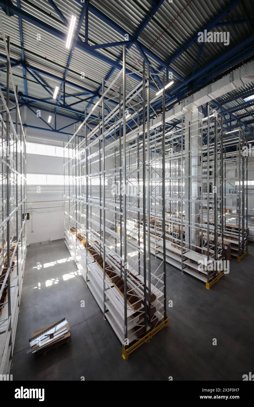 Modern warehouse with many shelves - big hall in sorting center Stock ...