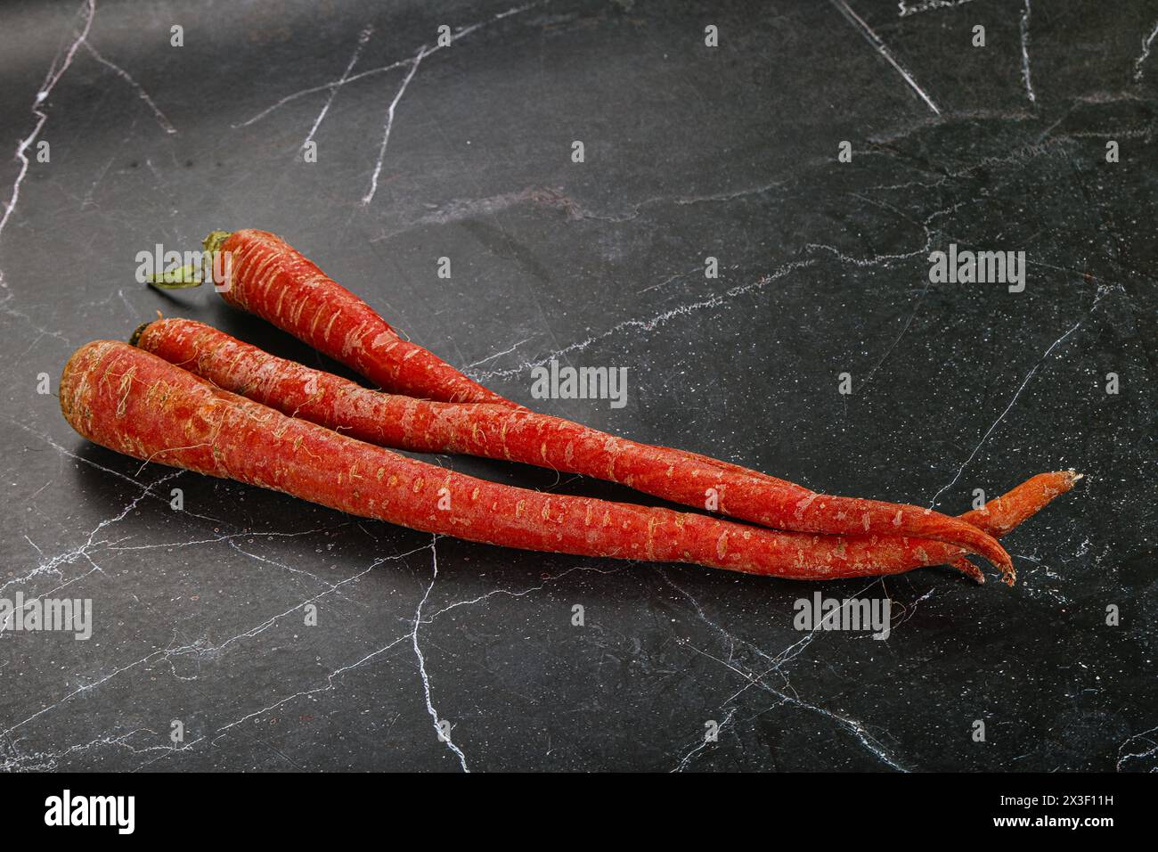 Indian red carrots indian market hi-res stock photography and images ...