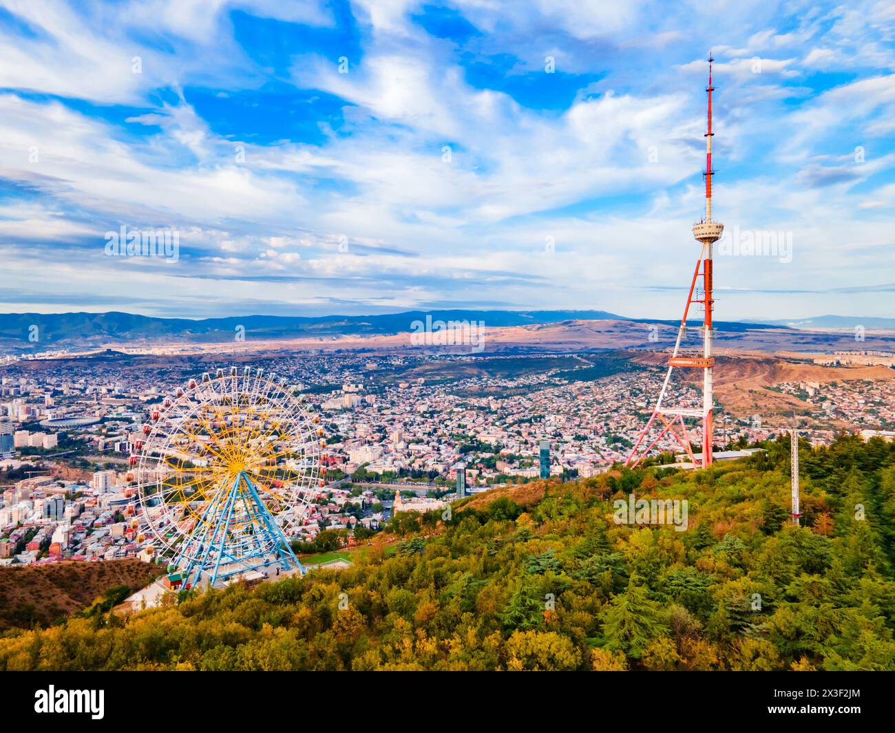 Ferris or Giant wheel and Tbilisi TV Broadcasting Tower aerial ...