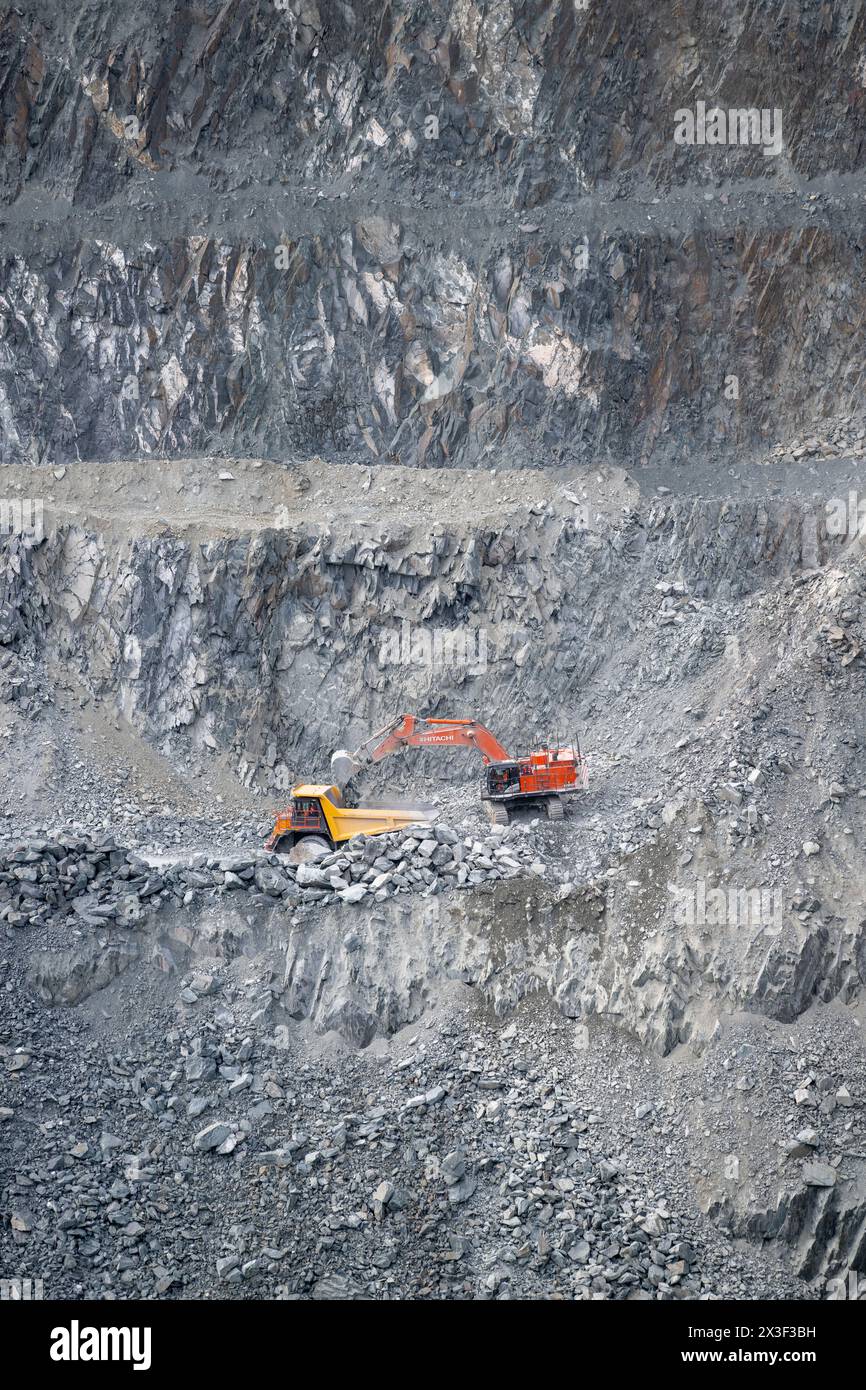 Digging out stone in a limestone quarry near Ingleton in the Yorkshire ...