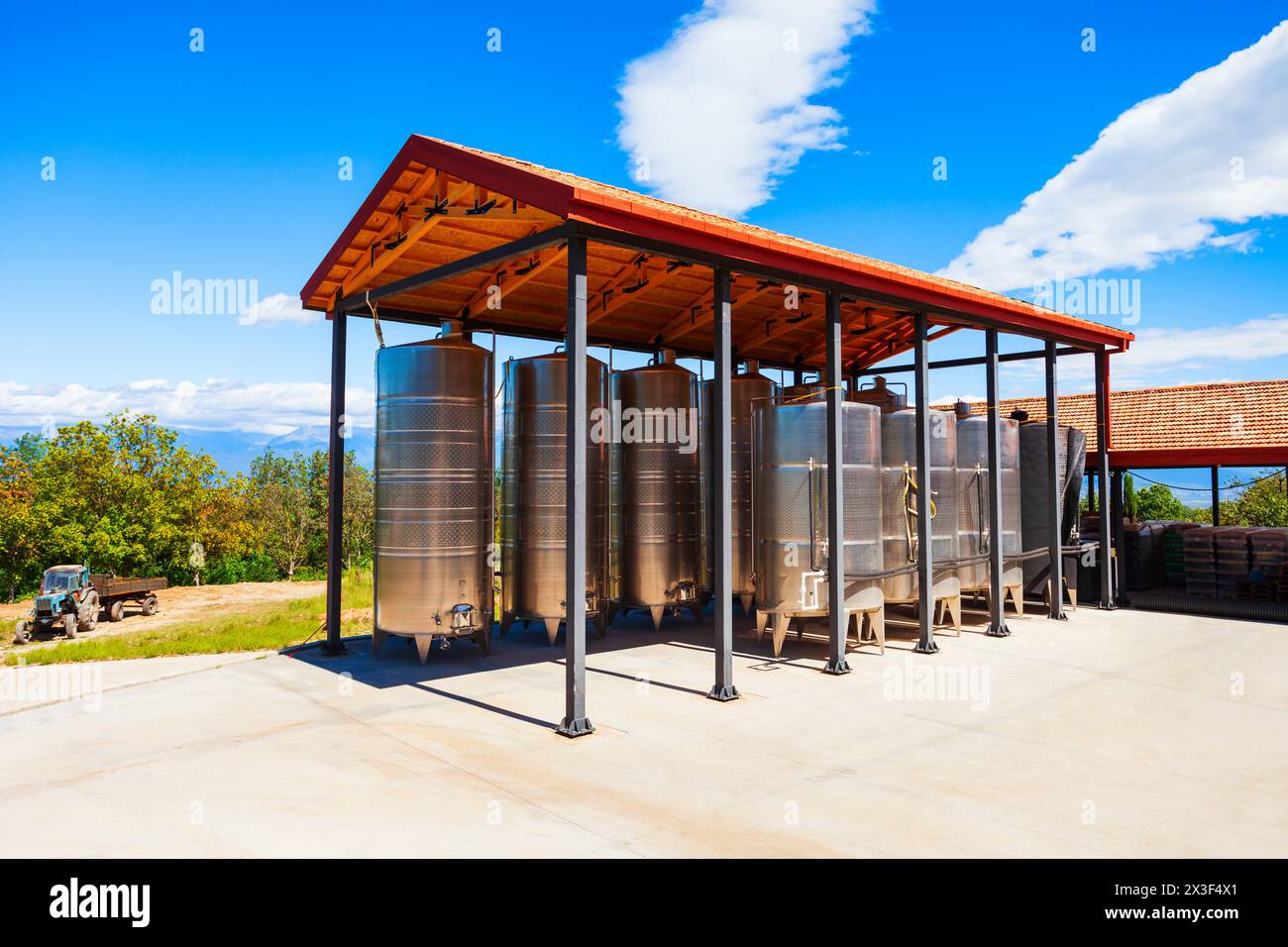 Stainless steel storage tanks with wine at open air Stock Photo - Alamy