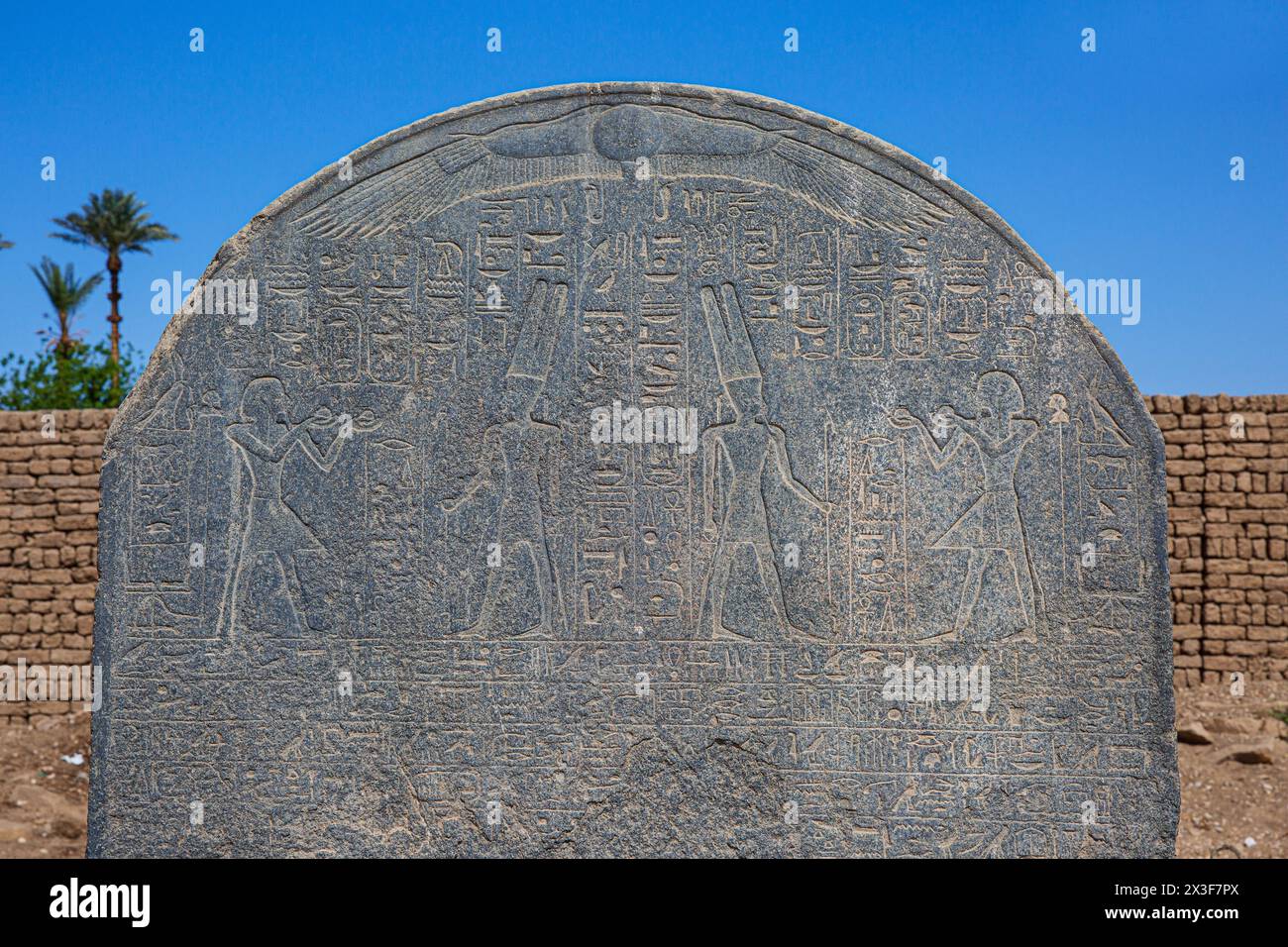 Ancient Egyptian stela depicting the god Amun receiving offerings at ...