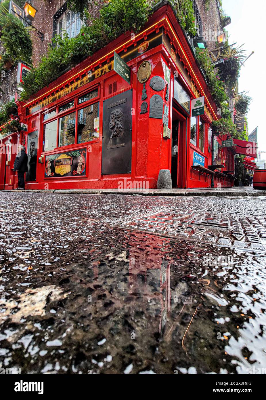 Dublin, Ireland. April 17, 2024: Tourist walking outside the famous ...