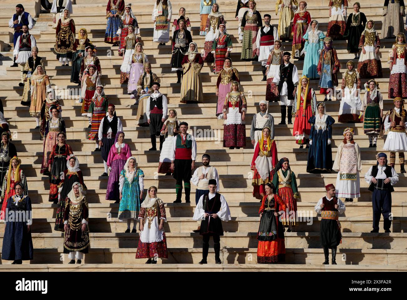 Performers wear different Greek traditional costumes during the Olympic ...