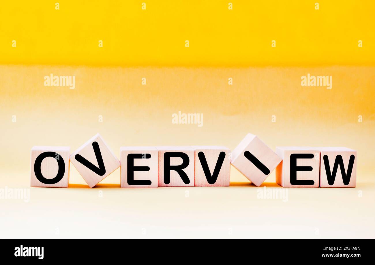 Overview word made from wooden cubes on a yellow background Stock Photo ...
