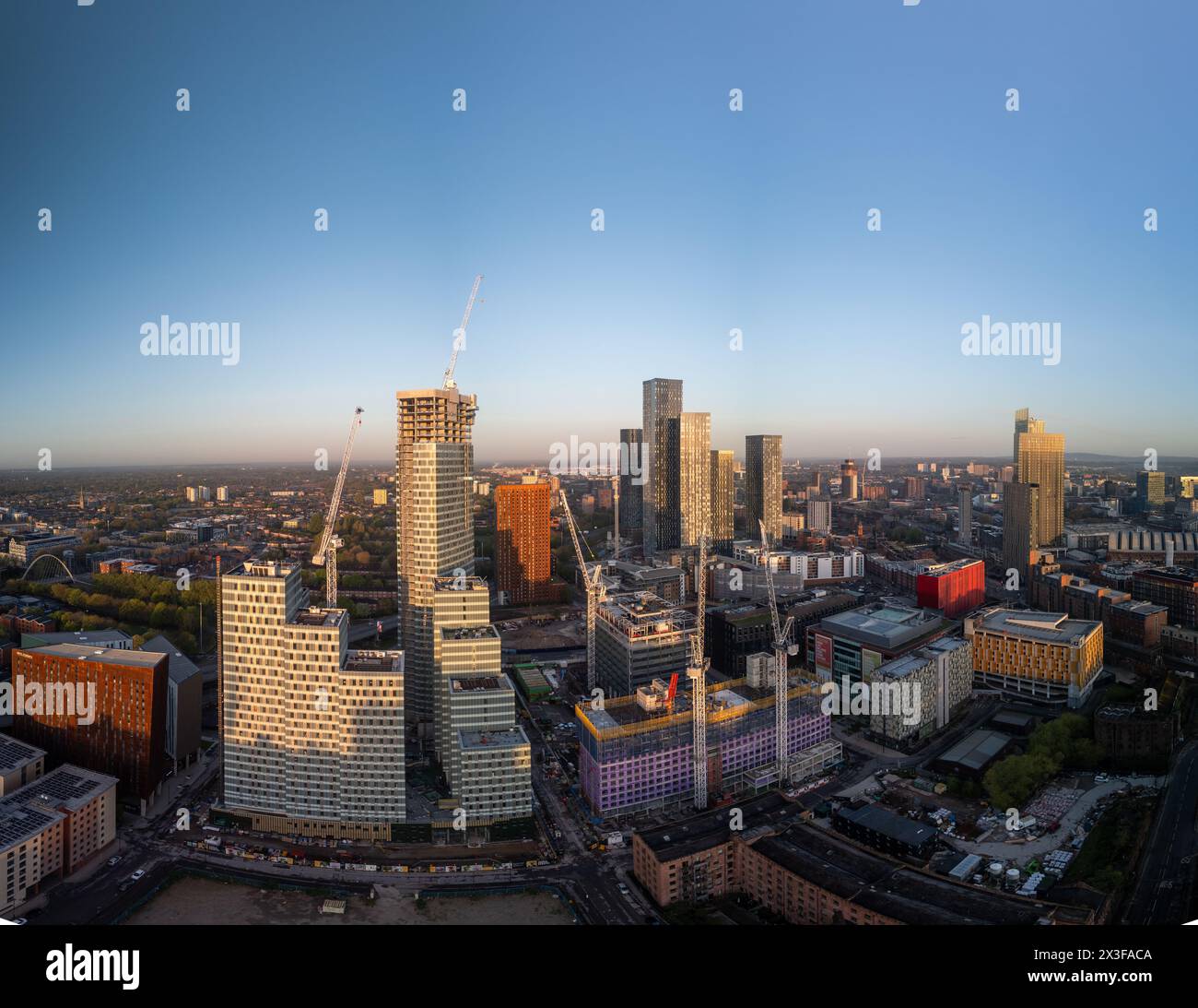 An aerial view capturing a modern city's high-rise buildings and ...
