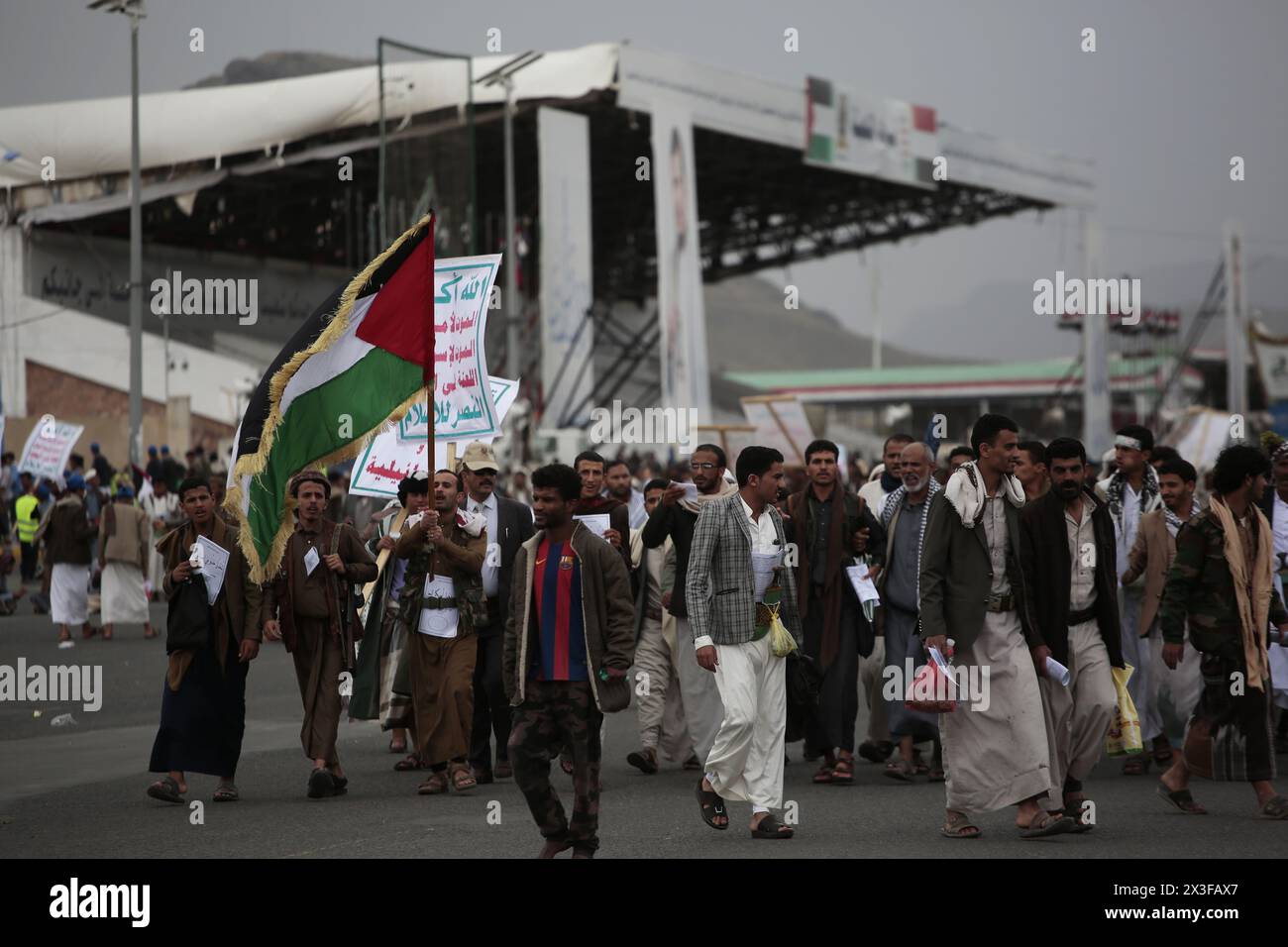 Houthi attire attend a protest in solidarity with the Palestinian ...