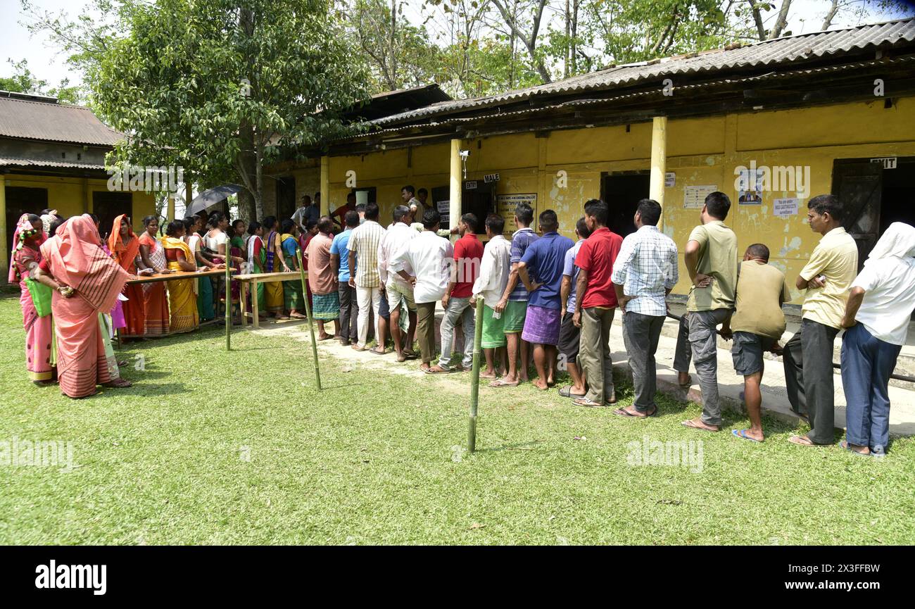 Guwahati, Guwahati, India. 26th Apr, 2024. Indian voter queue to cast ...