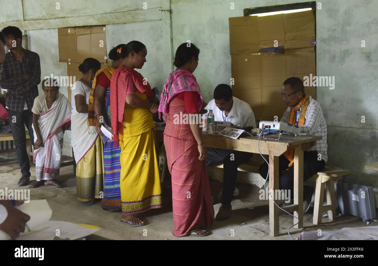Guwahati, Guwahati, India. 26th Apr, 2024. Indian voter queue to cast ...