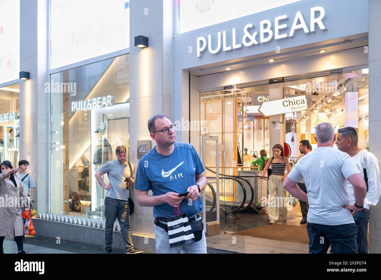 Shoppers are seen at the Spanish multinational clothing design retail ...
