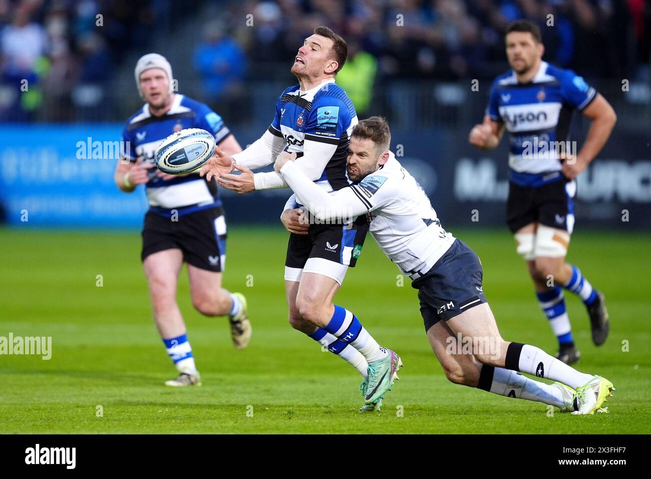 Bath Rugby's Ben Spencer is tackled by Saracens' Elliot Daly during the ...
