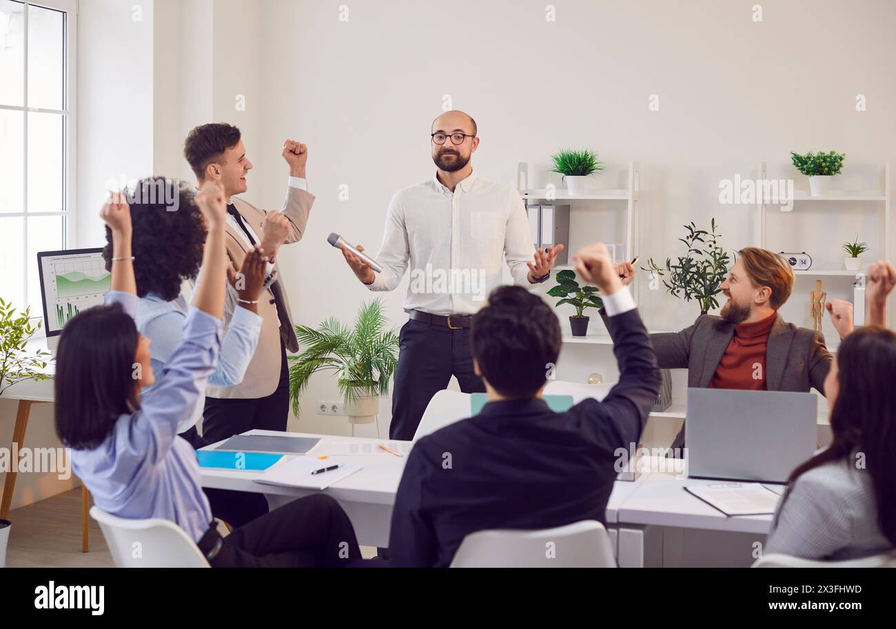 Office Team Applauding Colleague During Meeting Or Presentation Stock ...