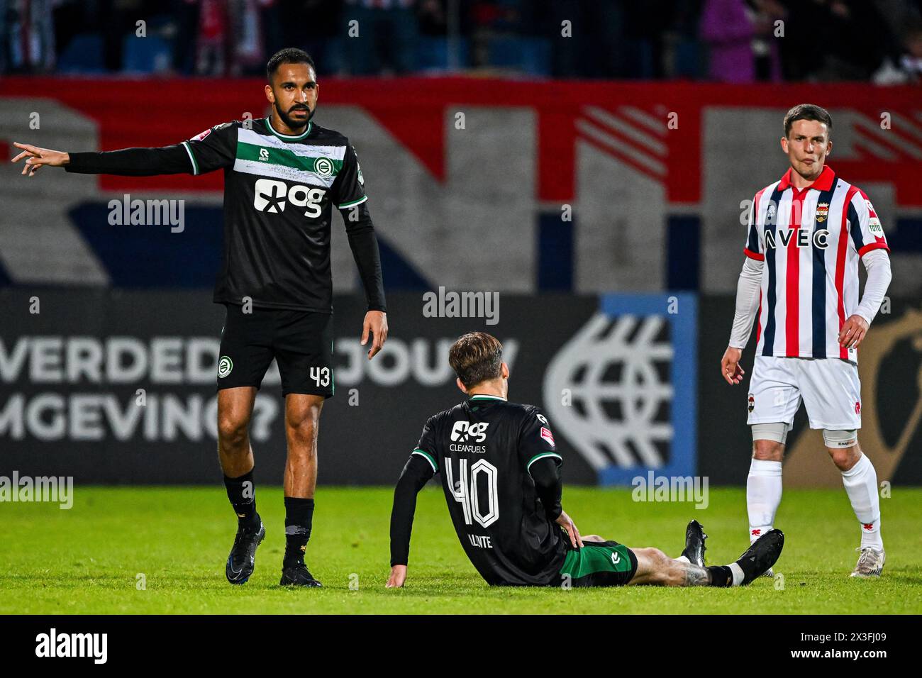 TILBURG - Luciano Valente of FC Groningen with an injury during the ...