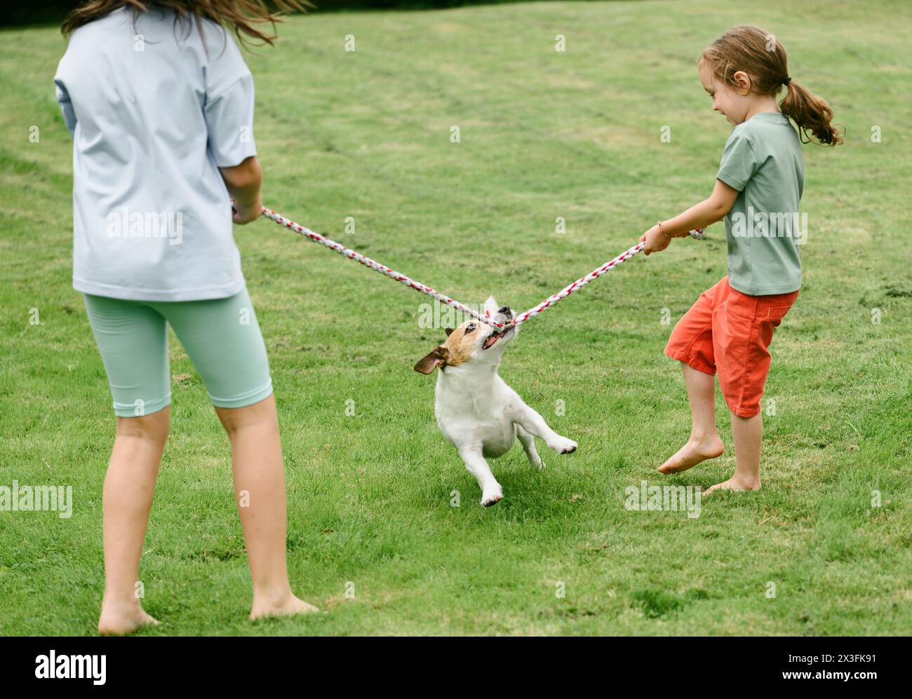 Children playing tug of war hi-res stock photography and images - Alamy