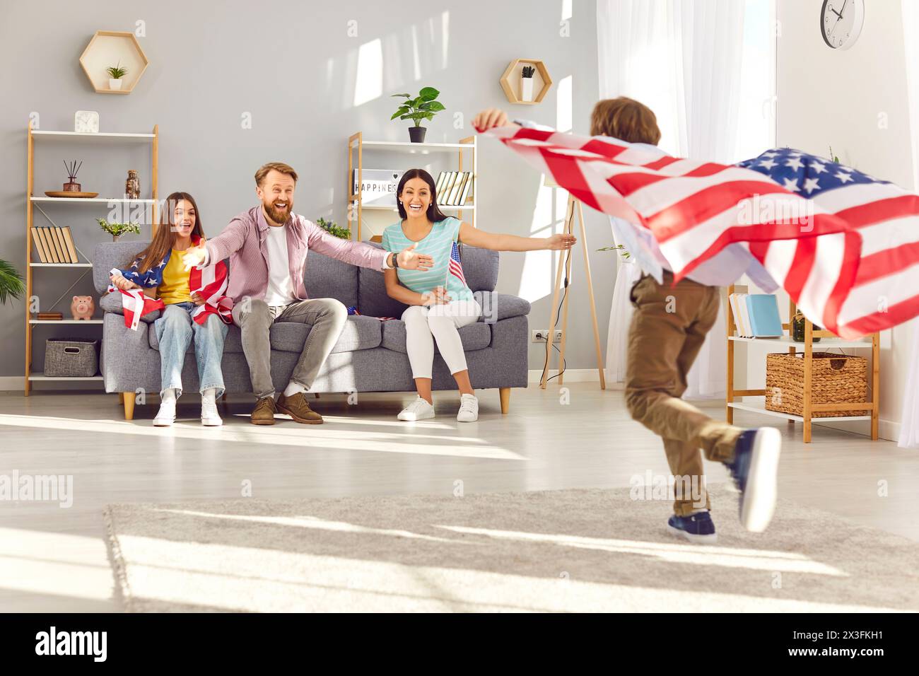 Happy kids having fun with flags of united states at home celebrating ...
