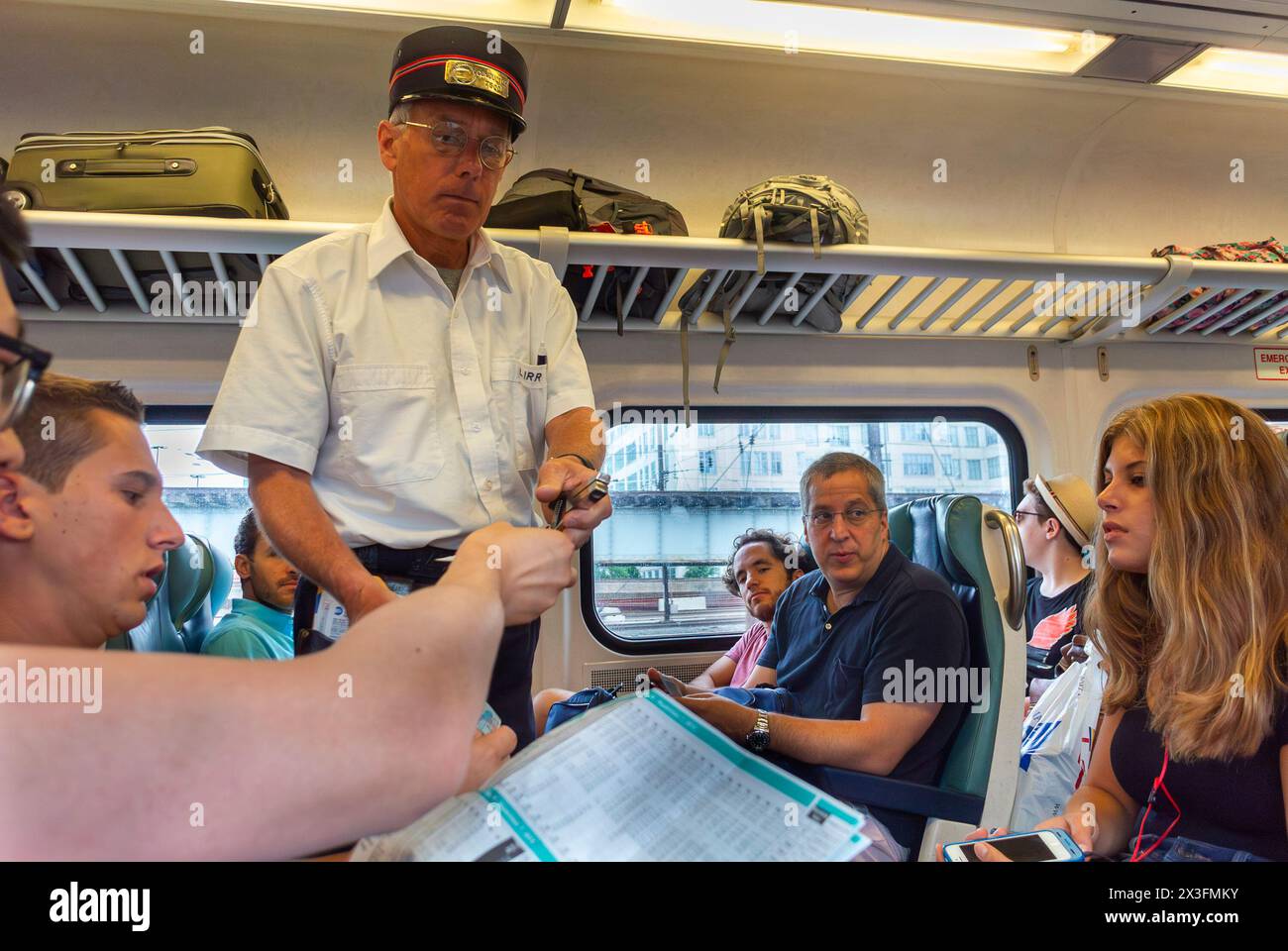 Crowd People, traveling on Long Island Railroad Train, Controller ...
