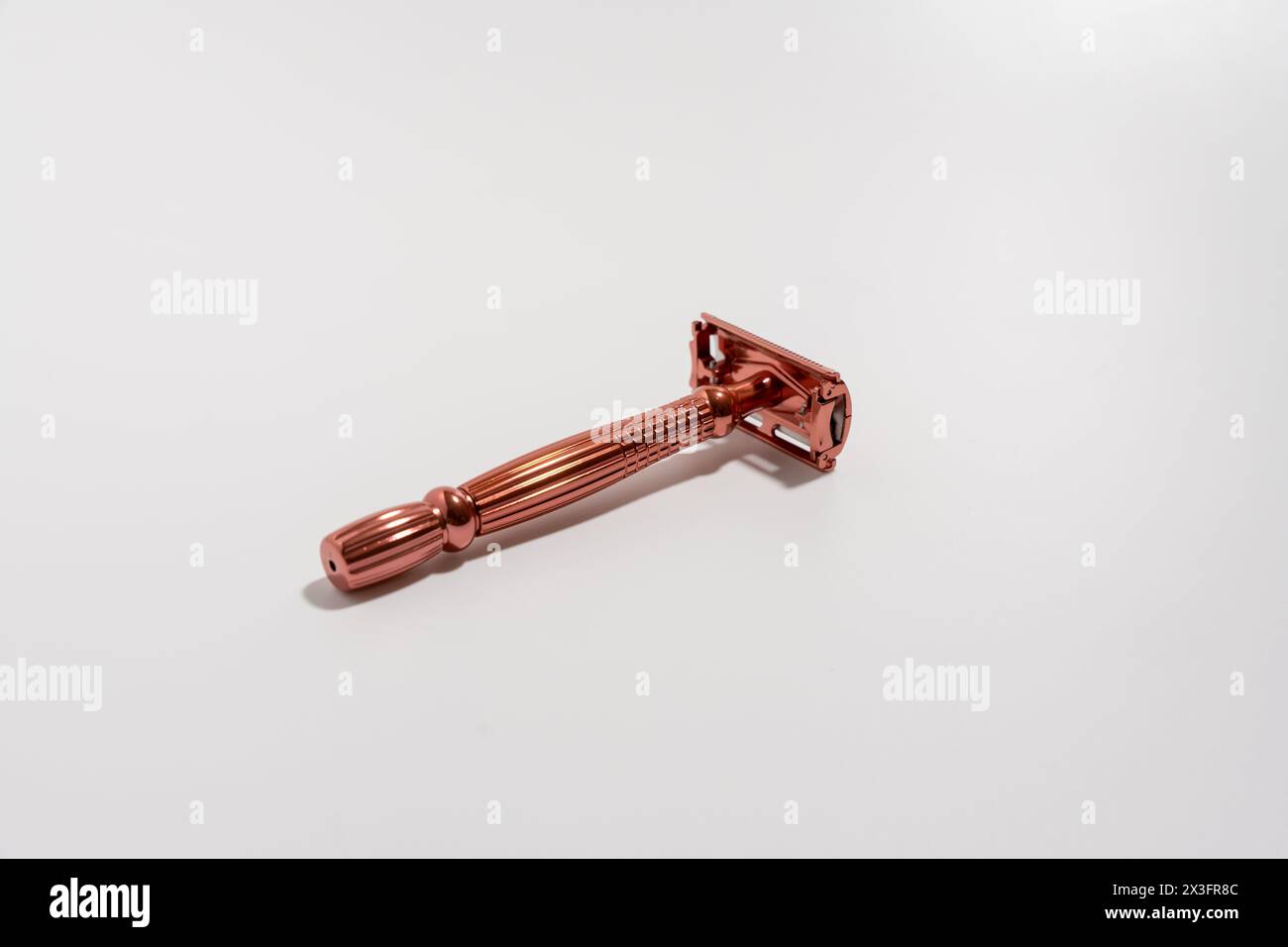 Metal razor on a white background. Razor close-up Stock Photo - Alamy