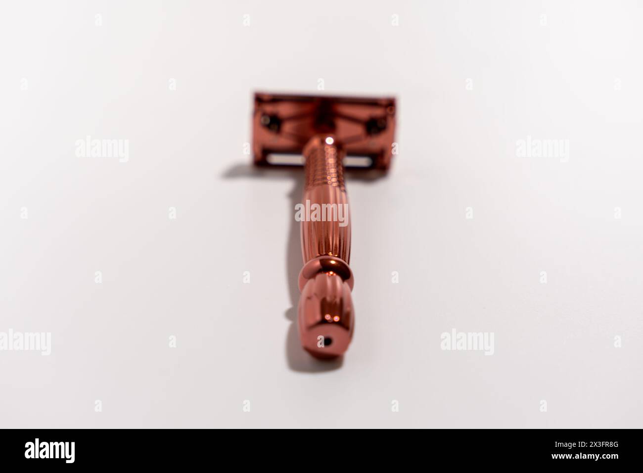Metal razor on a white background. Razor close-up Stock Photo - Alamy